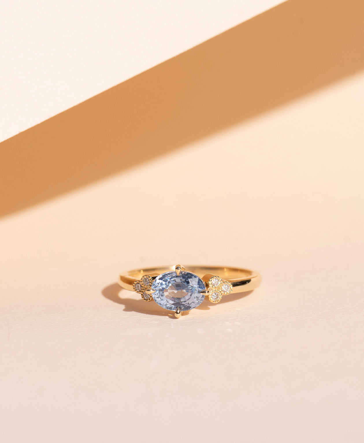 Mon Cheri Engagement Ring - 18k Yellow gold, 1.60 carat Oval Cut Blue Sapphire | Zoë & Morgan NZ