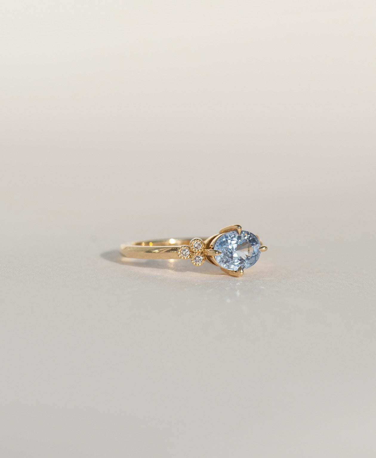Mon Cheri Engagement Ring - 18k Yellow gold, 1.60 carat Oval Cut Blue Sapphire | Zoë & Morgan NZ